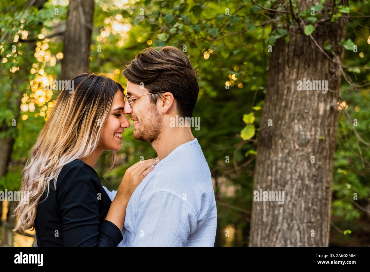Newly in love couple walk planning their life in common Stock Photo - Alamy
