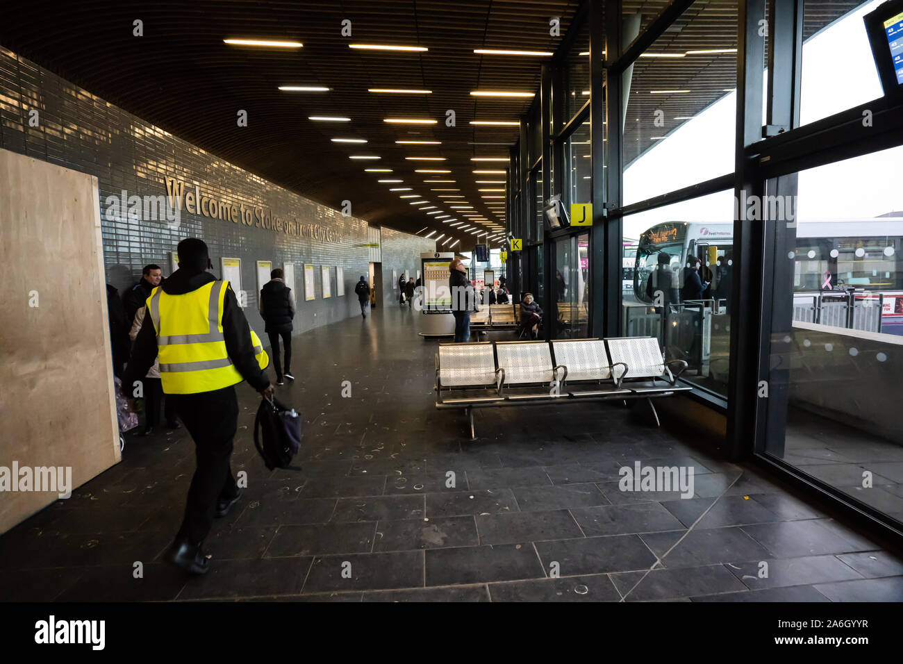 Hanley bus station in the city centre, commuters waiting or rushing to ...