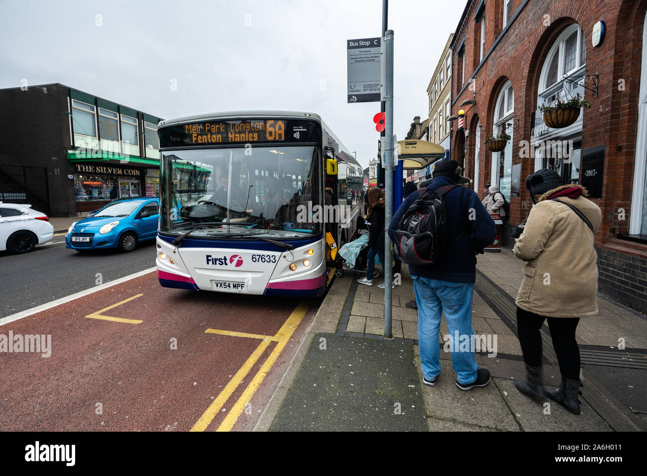 People queue and board the First bus service from Fenton, Longton to ...