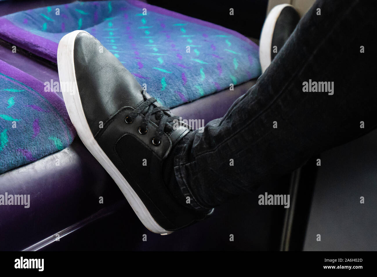 Man feet seat bus hi-res stock photography and images - Alamy