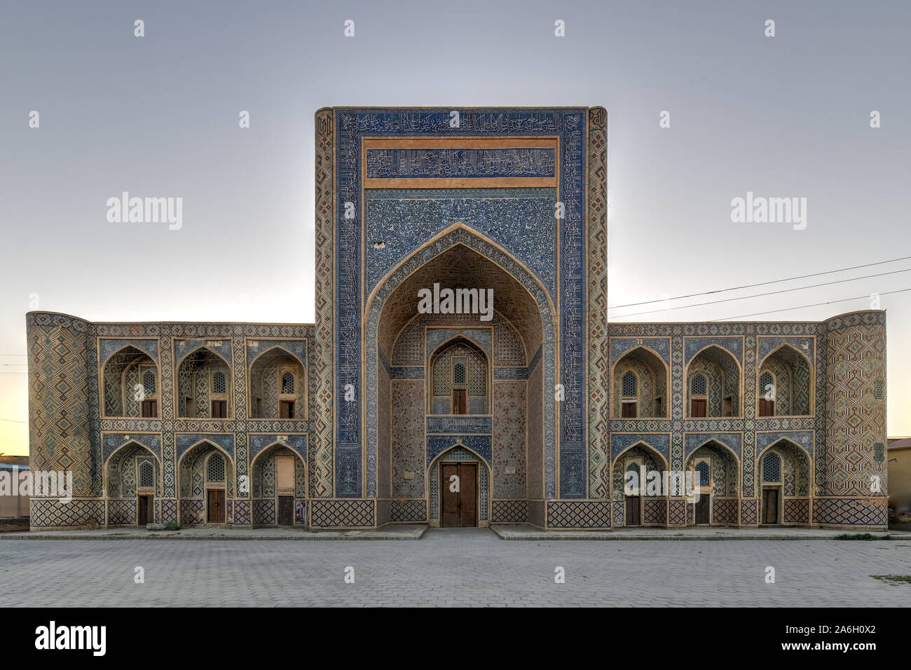Abdullah Khan Madrassah boasts the perfectly decorated courtyard with ...