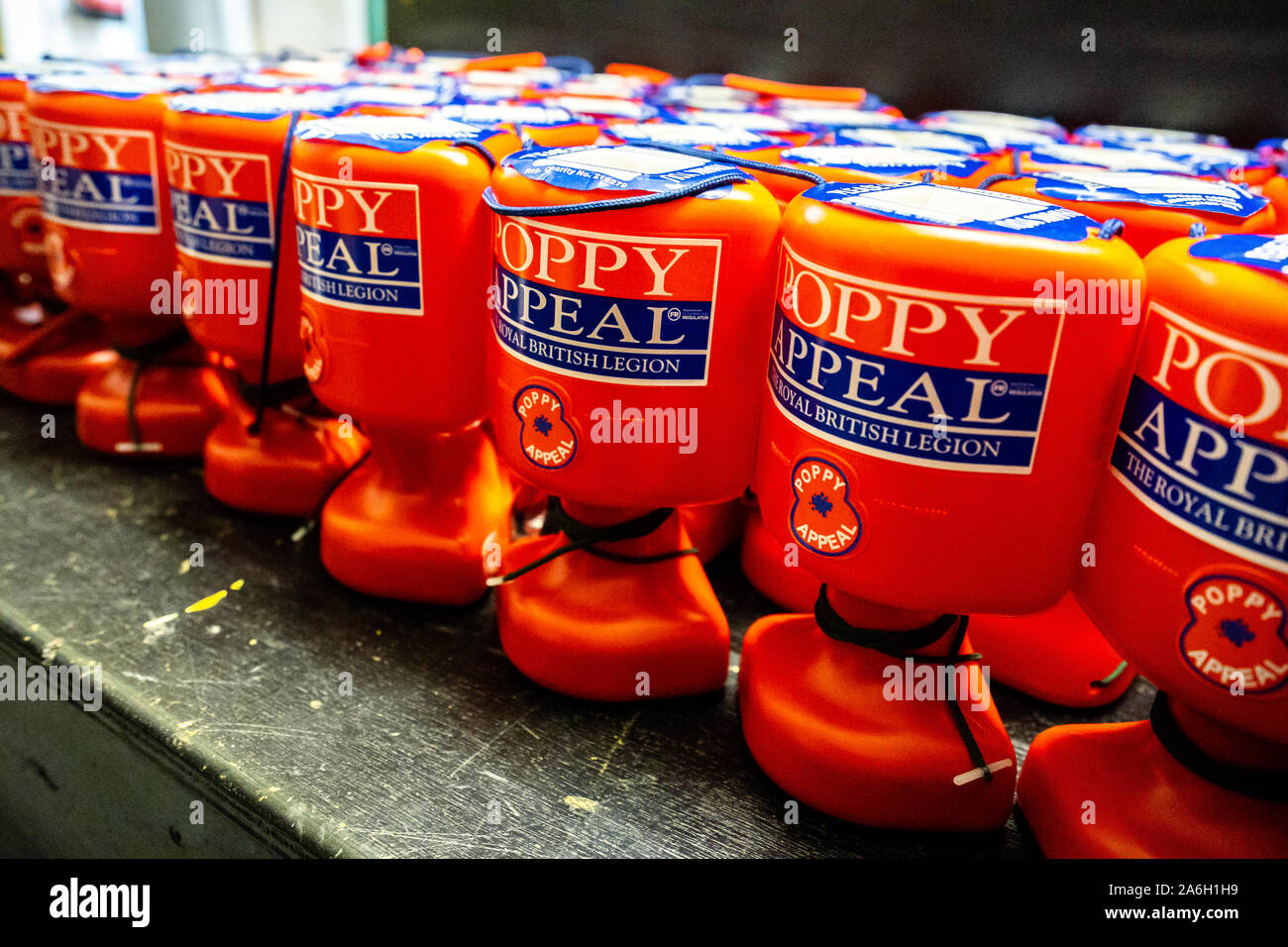 Donation tins for the Royal British Legion Poppy Appeal are collected ...