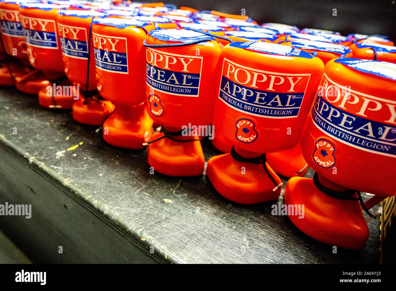 Donation tins for the Royal British Legion Poppy Appeal are collected ...