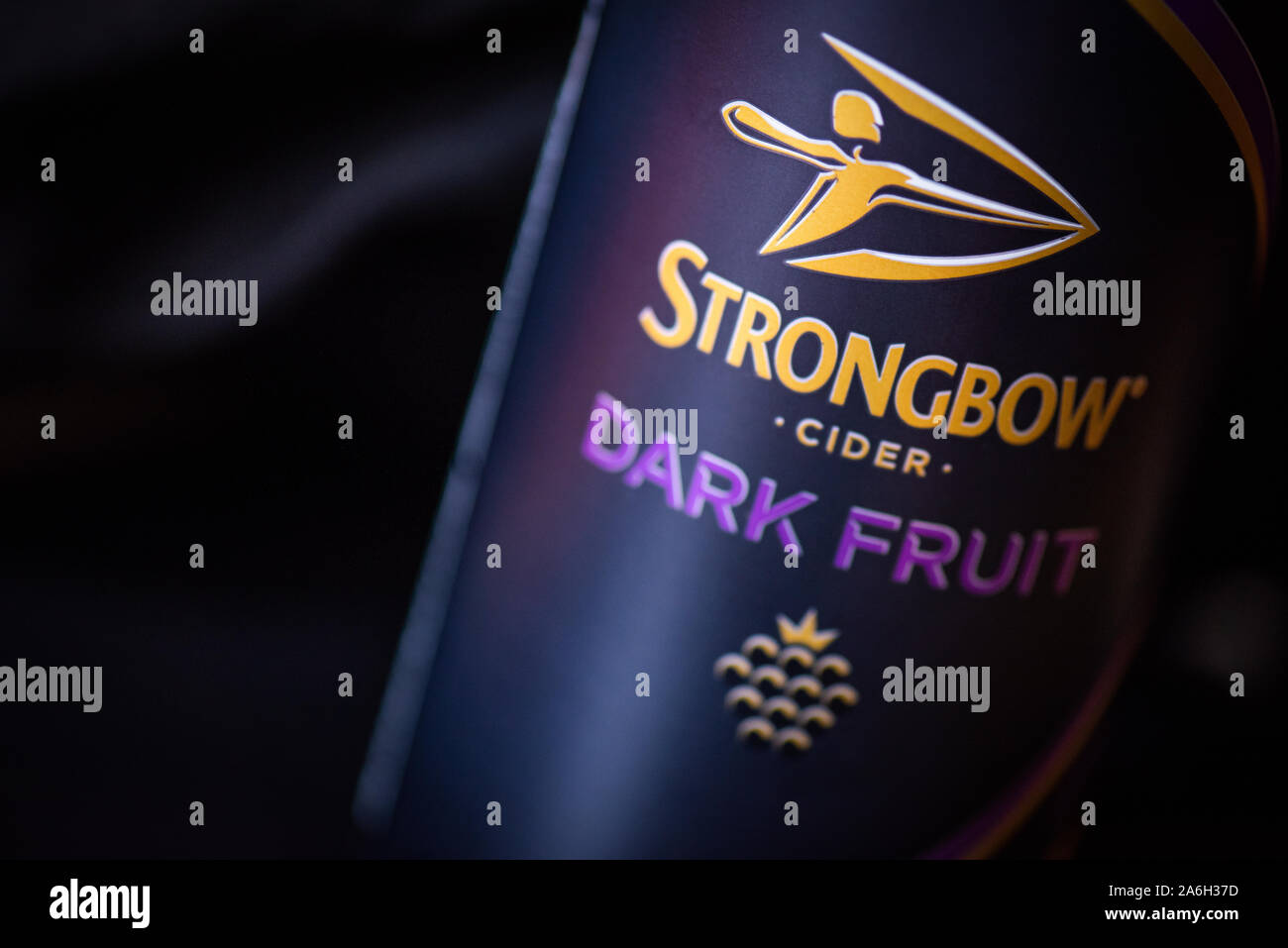 A can of cold Strongbow Dark fruits ready to be drank on a black ...