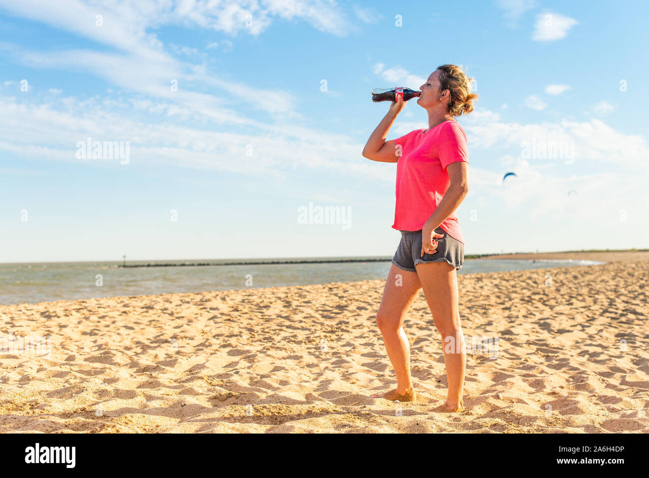 Women drinking coca cola hi-res stock photography and images - Alamy