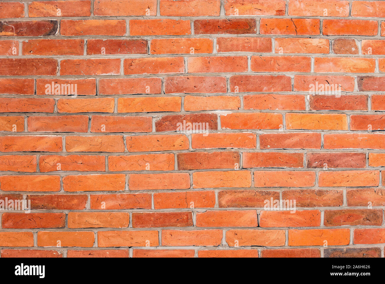 Red brick wall background inside of the room Stock Photo - Alamy