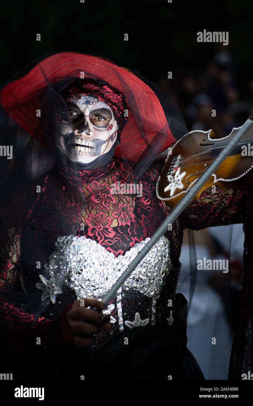 Mexico City, Mexico, 26/10/19, A woman dressed as Catrina attends the ...