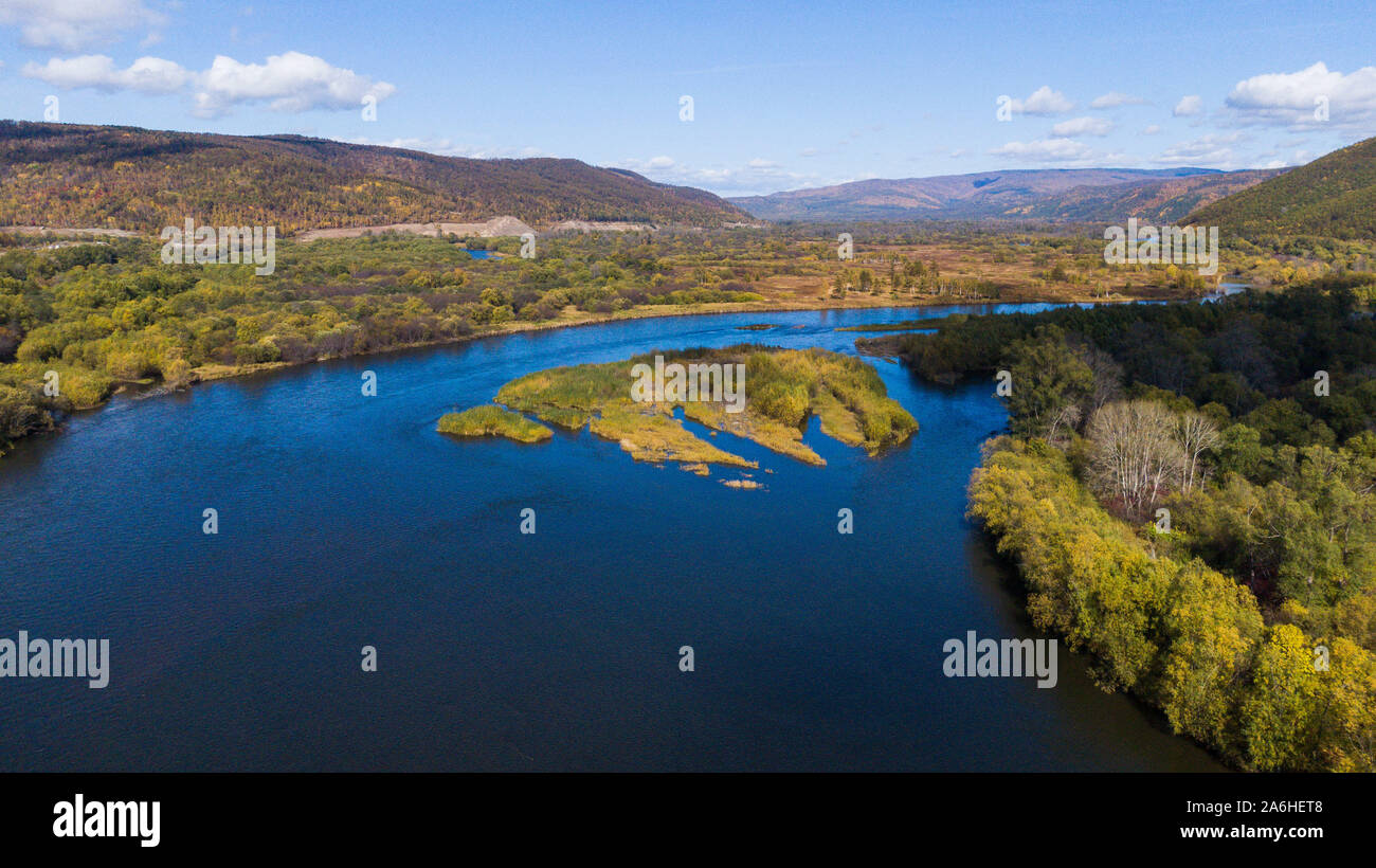 Top view of the taiga forest, river, road . The vast expanses of ...