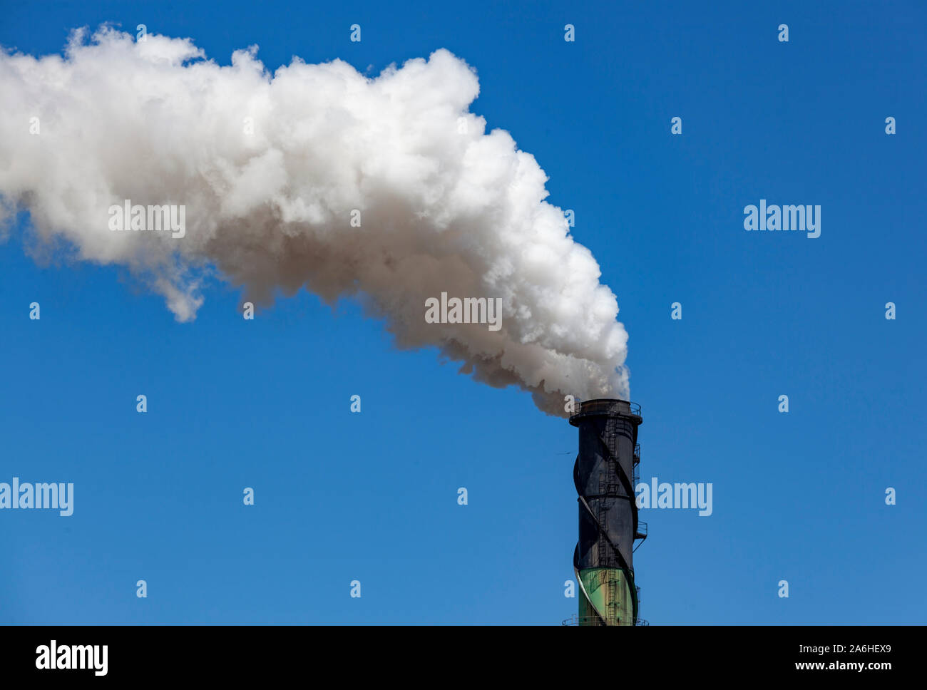 smoke stack billowing smoke Stock Photo - Alamy