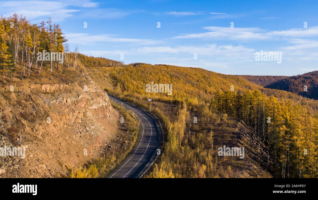 Top view of the taiga forest, river, road . The vast expanses of ...