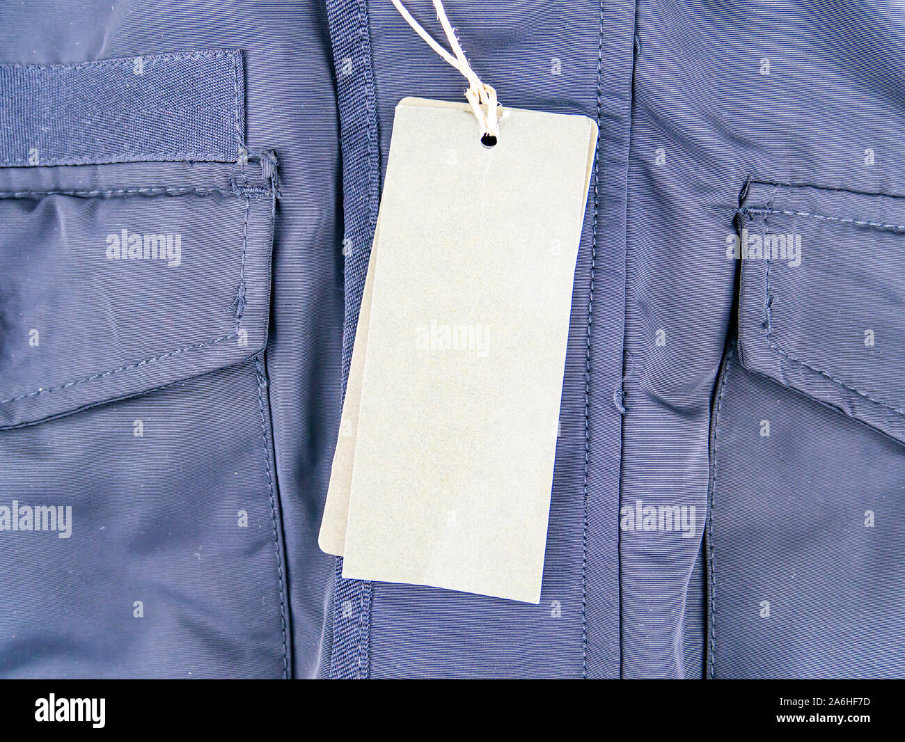 Blank label on the jacket. Place for text. Autumn collection of clothes ...