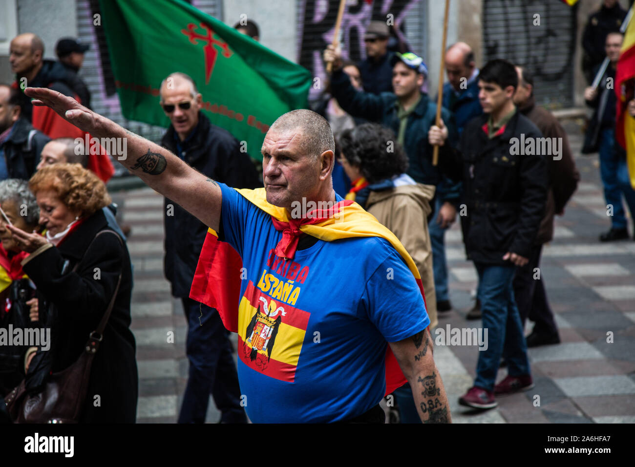 Pro Franco and fascism supporter salutes during the rally. Every ...
