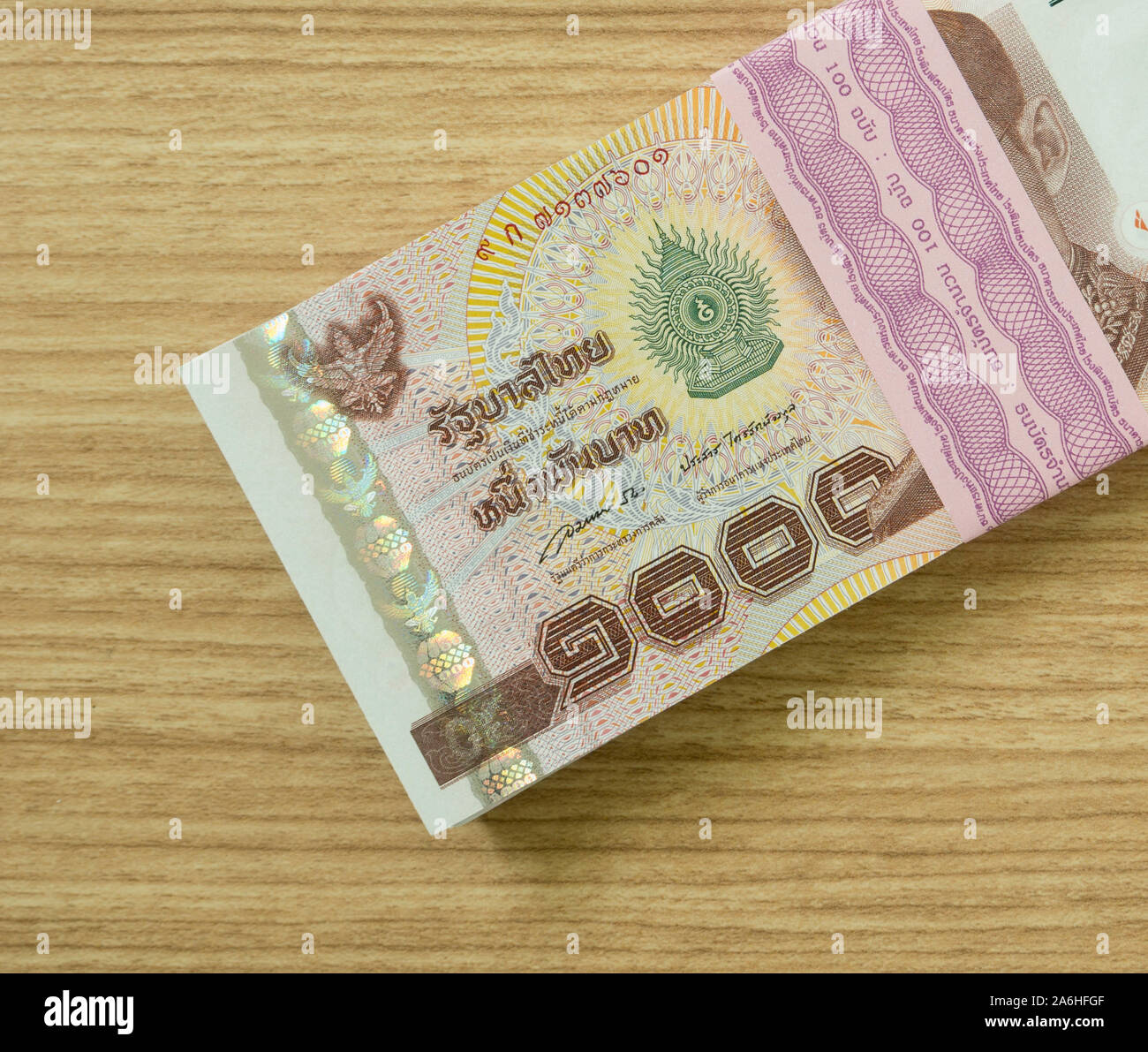 one Thousand thai banknotes put on table . money concept Stock Photo ...
