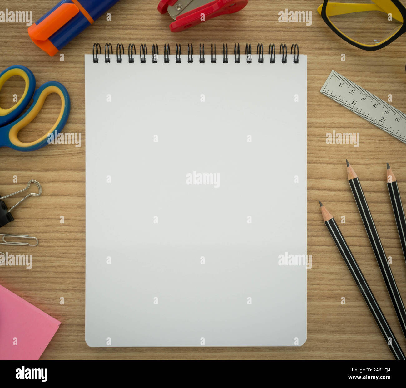 Notebook and stationery on desk. education concept , view top Stock ...