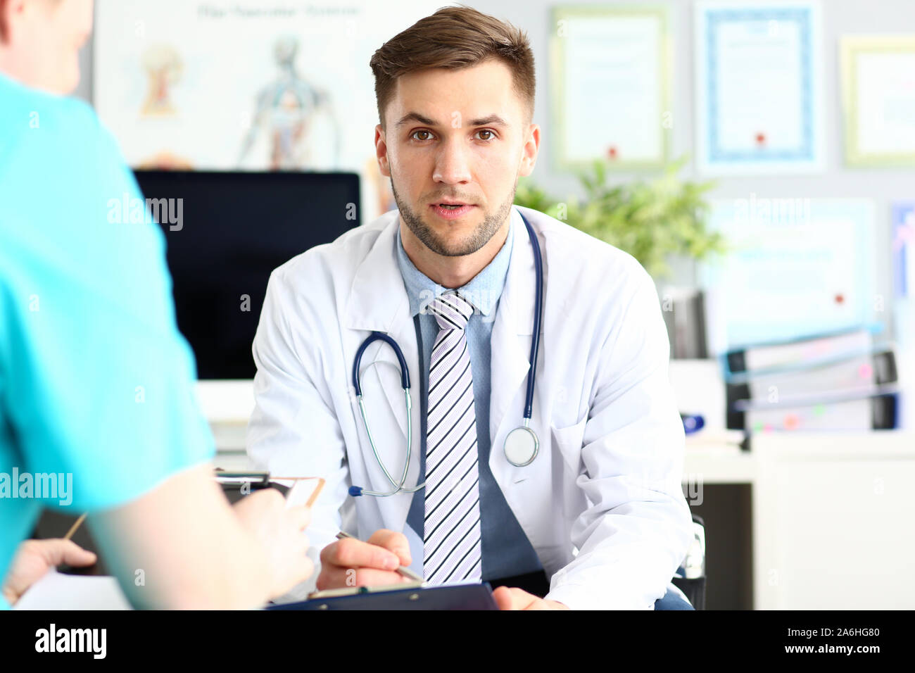 Concerned bearded doctor Stock Photo - Alamy
