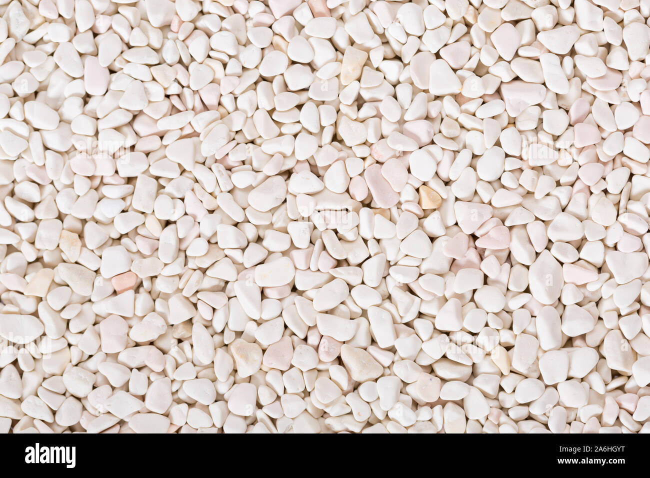 White, grey pebbles stone texture and background Stock Photo - Alamy