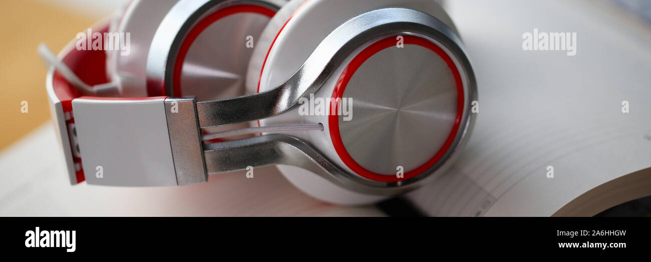 Headphones are on the table in the office Stock Photo - Alamy