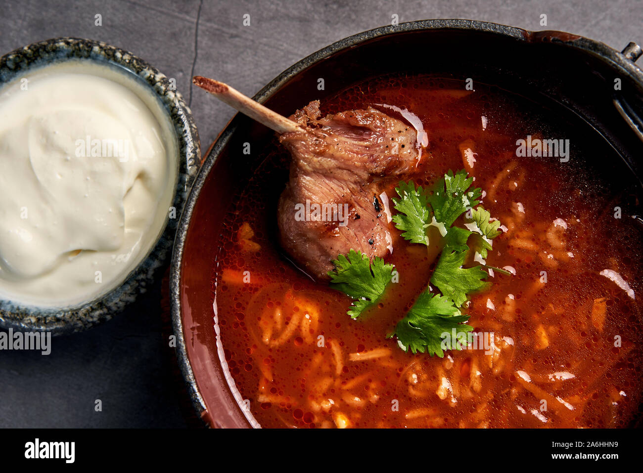 hot red soup with meat Stock Photo - Alamy