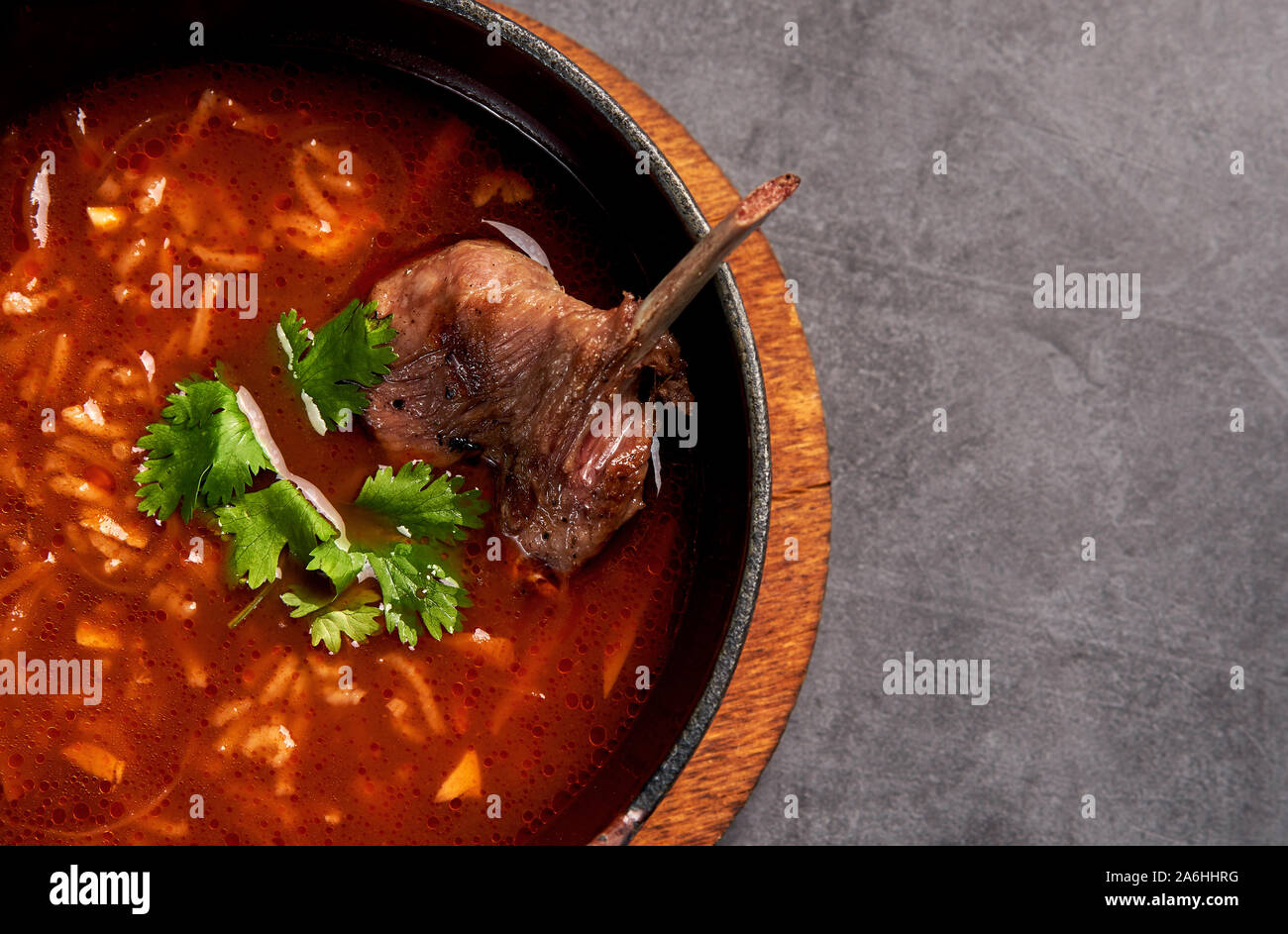 hot red soup with meat Stock Photo - Alamy