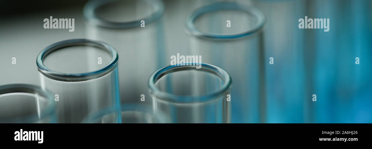 Test tube of glass overflows liquid solution potassium Stock Photo - Alamy