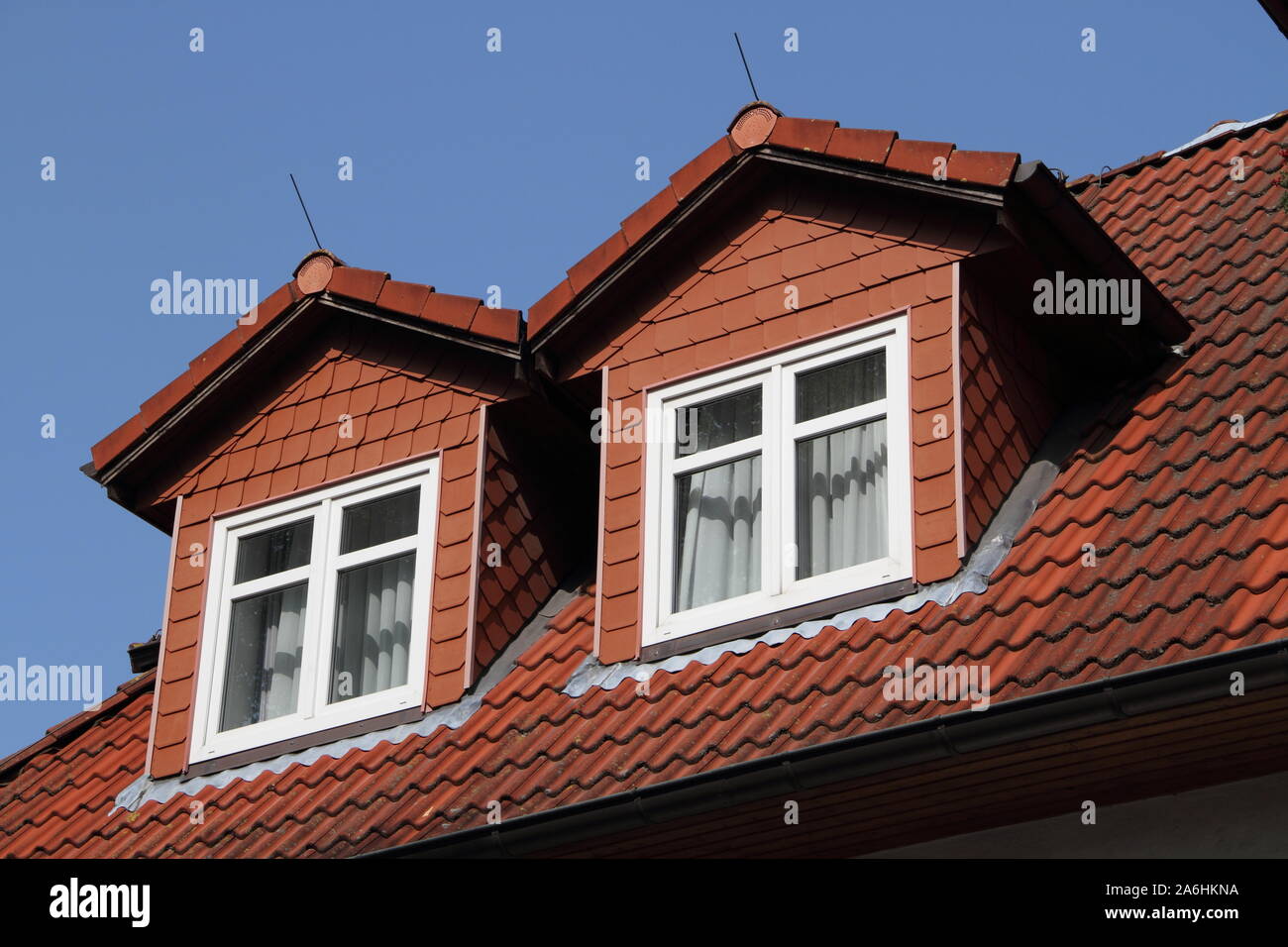House with roof window Stock Photo - Alamy