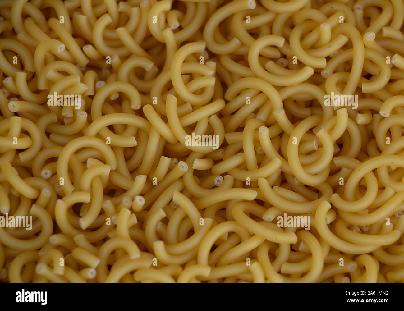 Small dry pasta food texture background closeup Stock Photo - Alamy