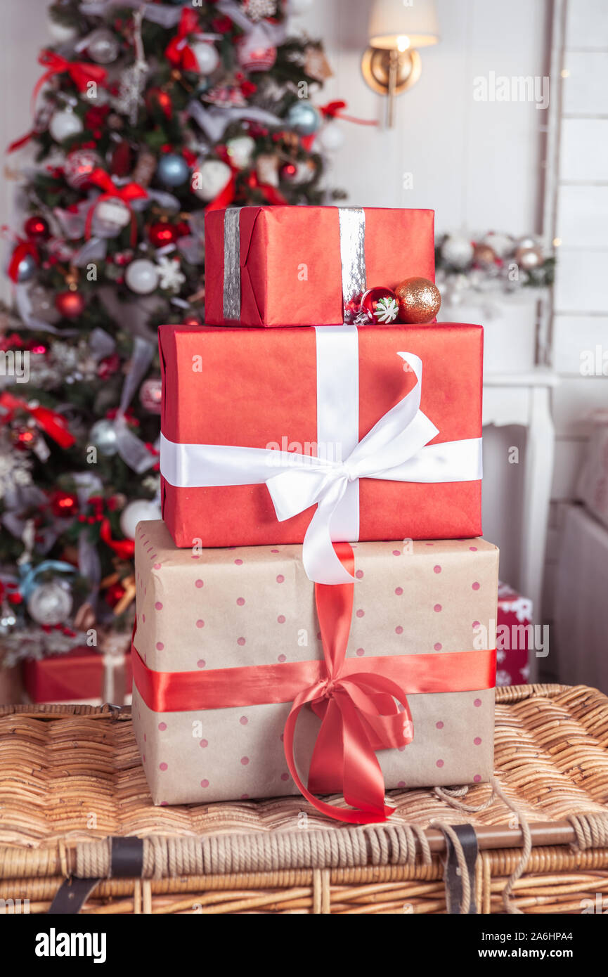 Boxes tied with ribbons one on one against the background of a ...