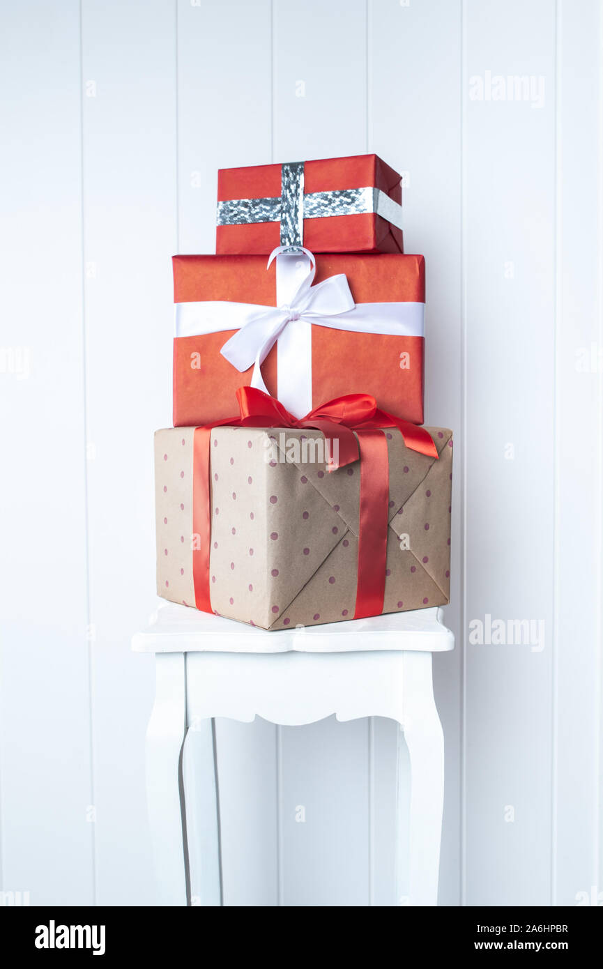Creative, bright photo minimalism, one-on-one gift boxes on a white ...