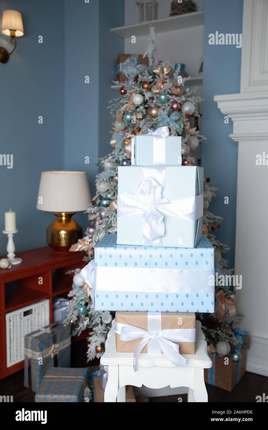 Boxes tied with ribbons one on one against the background of a ...