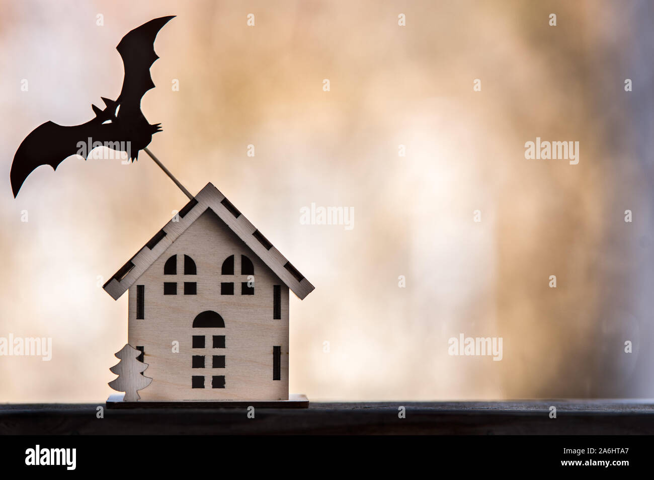Toy house with a bat, Background for halloween, autumn, loneliness ...