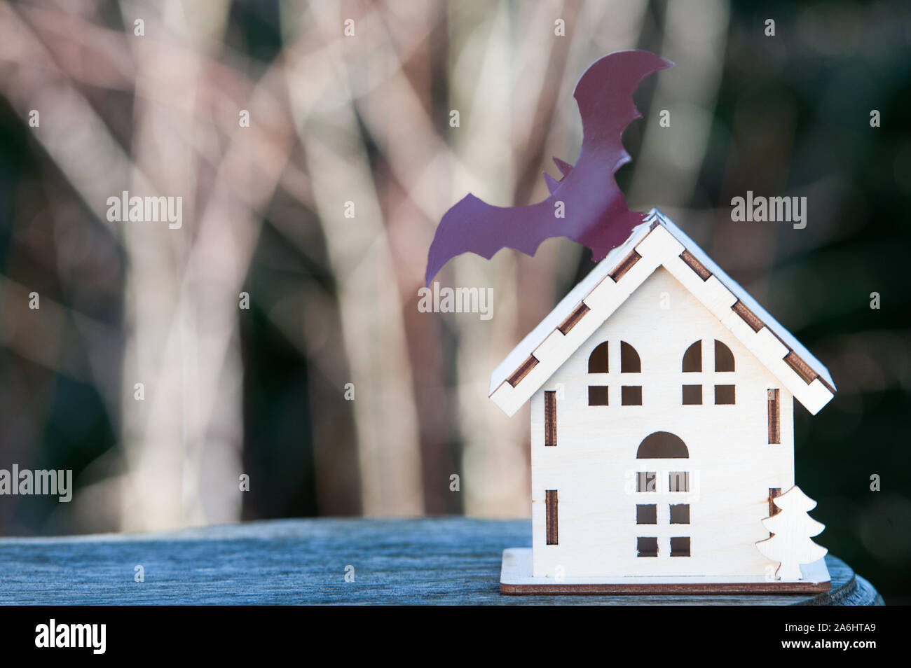 Toy house with a bat, Background for halloween, autumn, loneliness ...