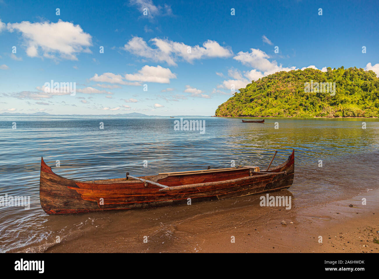 Tropical beach with traditional boat near Nosy Be, Madagascar Stock ...