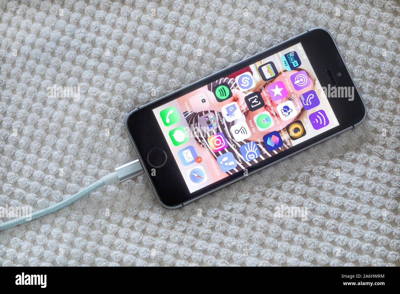 An iphone charging Stock Photo - Alamy