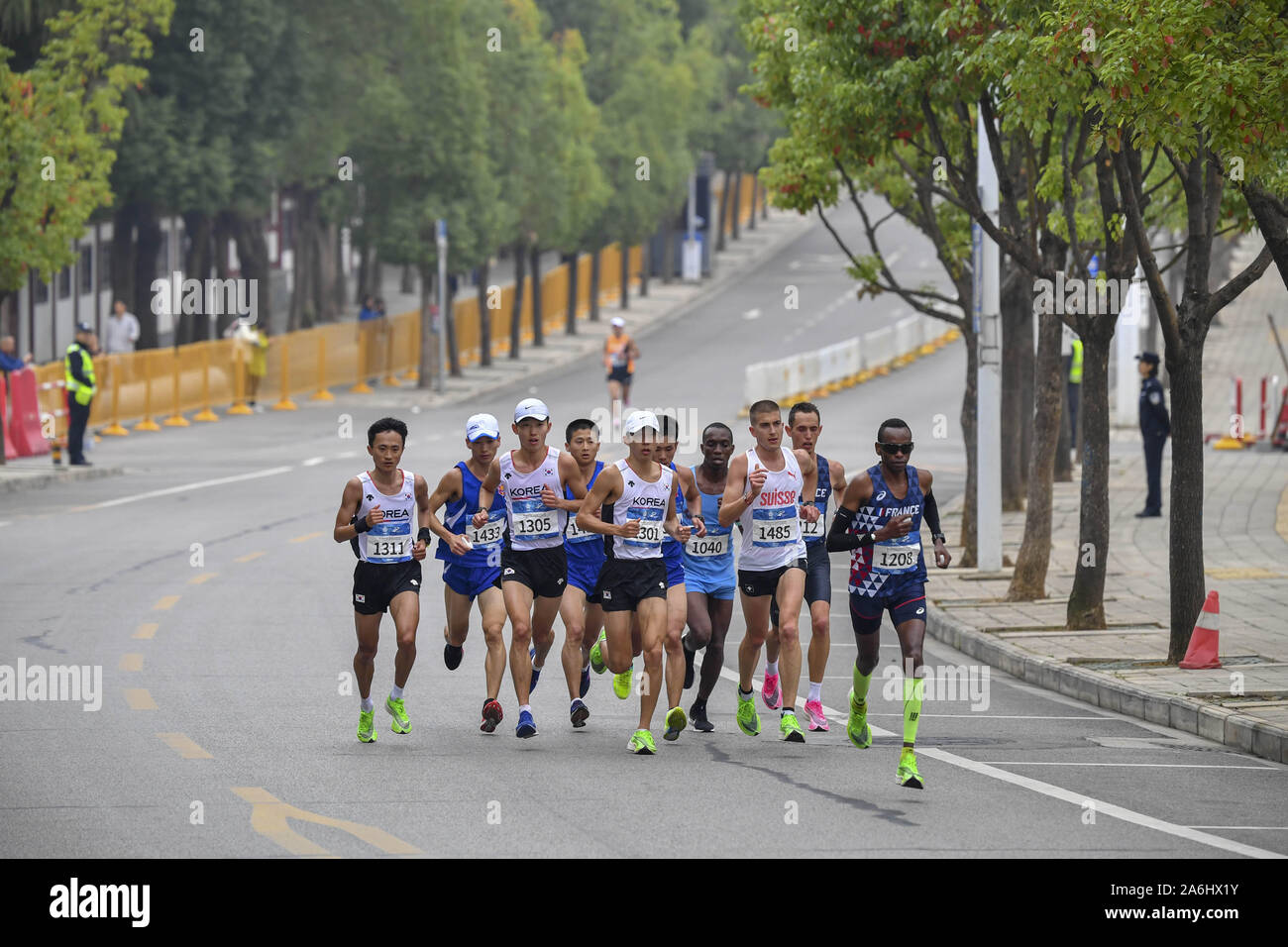 Wuhan, China. 27th Oct, 2019. Athletes compete during the men's ...