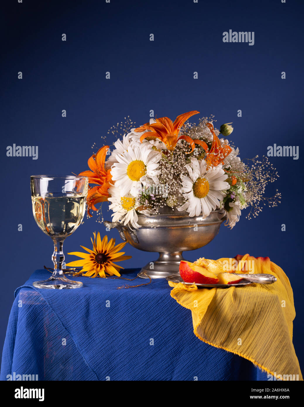 Still life with bright flowers on a blue background Stock Photo - Alamy