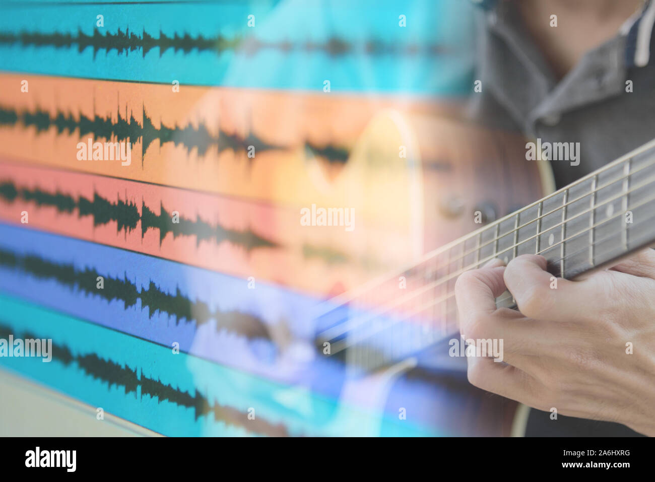 playing guitar for sound recording program Stock Photo - Alamy