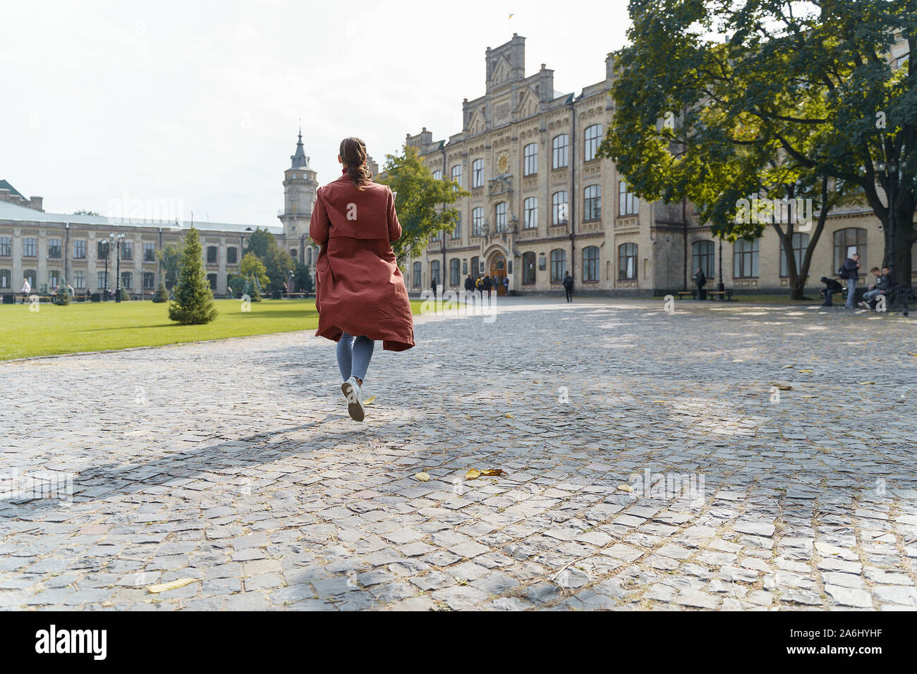 Back view of a beautiful young woman going to her university Stock ...