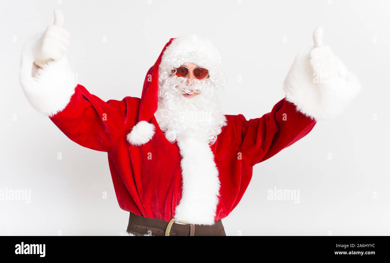 Happy Santa showing thumbs up for citizens in warm countries Stock ...