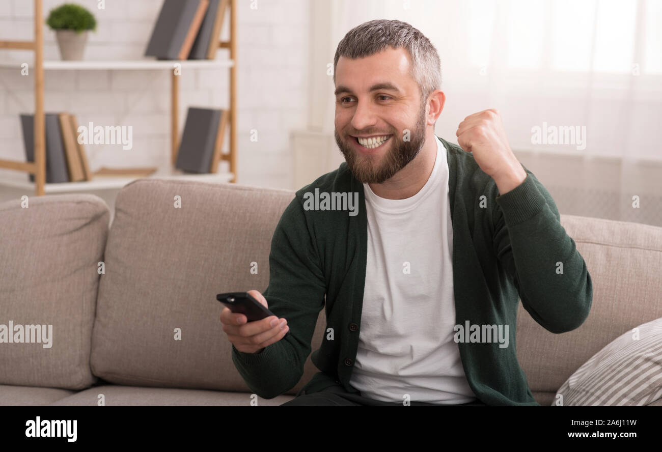 Smiling middle aged football fan hi-res stock photography and images ...