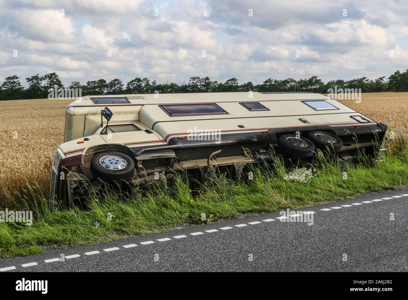 Motorhome lying in a ditch after an accident is seen near the Hvide ...