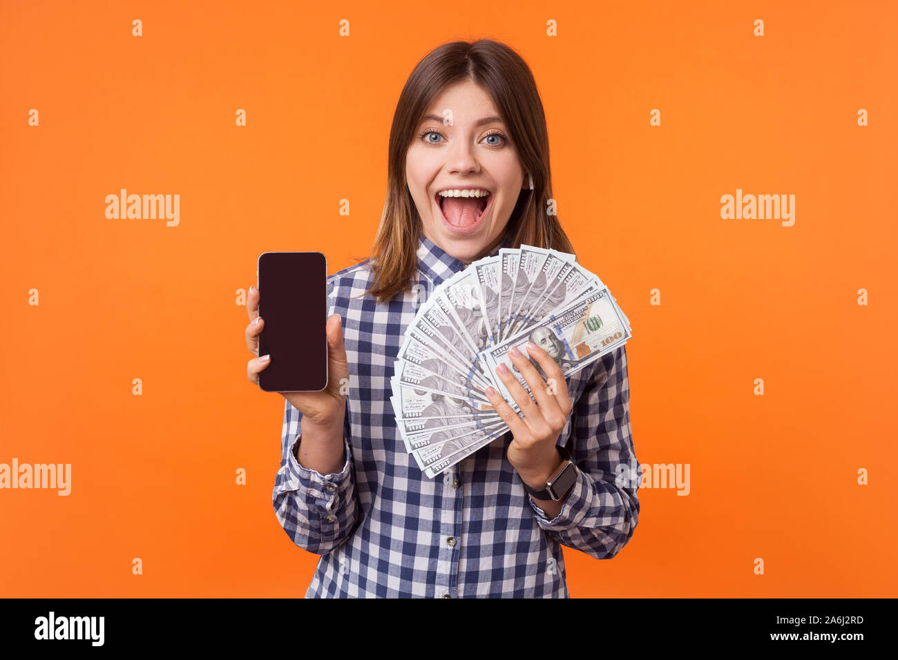 Portrait of successful brunette woman with big amazed eyes and open ...