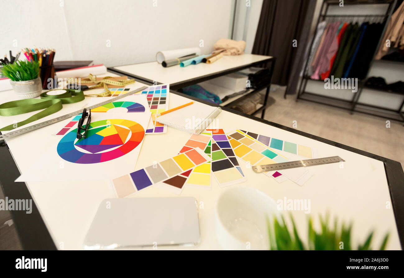 Clothing Designer's Workdesk Background With Sewing Tools, Selective ...