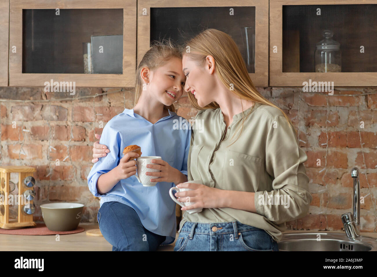 Daughter sharing tea hi-res stock photography and images - Alamy