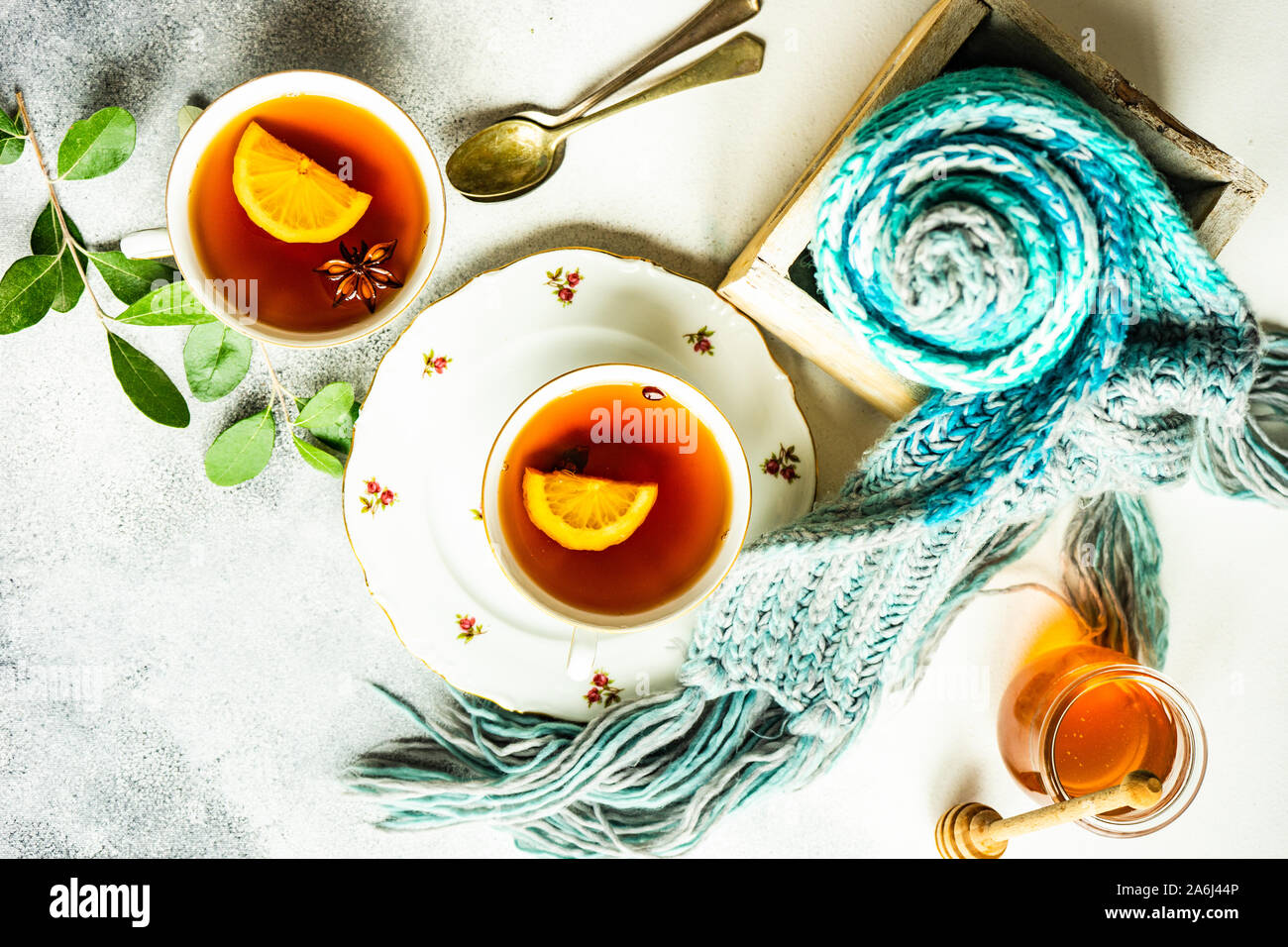 Mulled tea with lemon and spices on stone table with copy space Stock ...