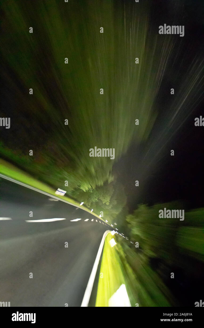 Very fast with extreme speed over the highway at night Stock Photo - Alamy