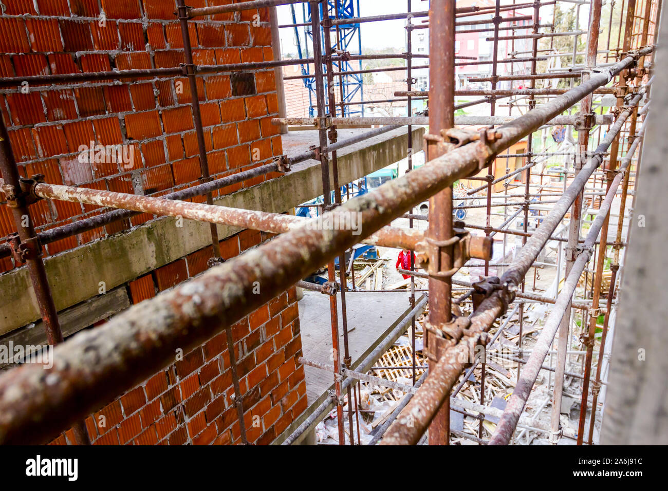 Scaffold is placed against edifice, building under construction Stock ...