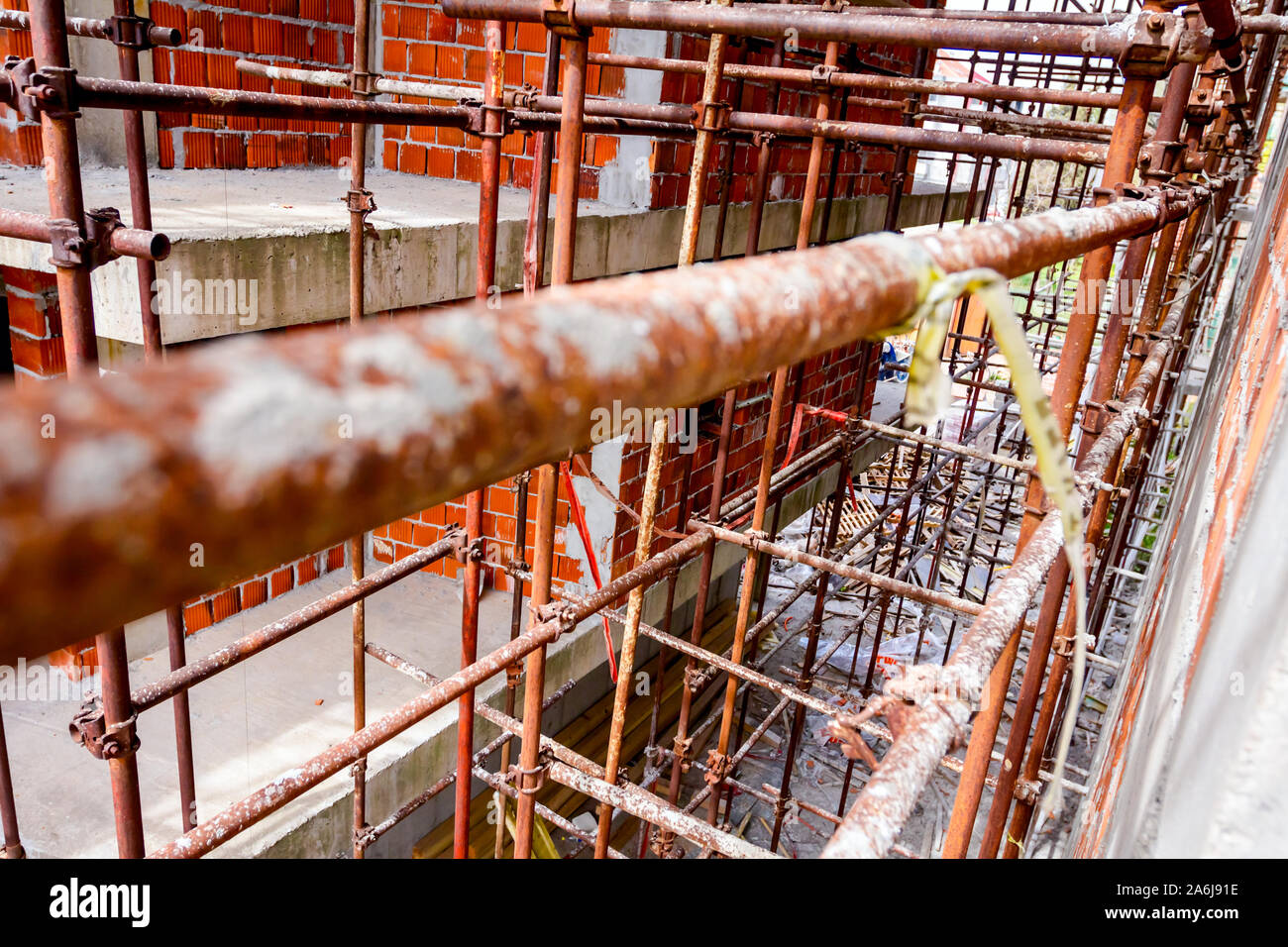 Scaffold is placed against edifice, building under construction Stock ...