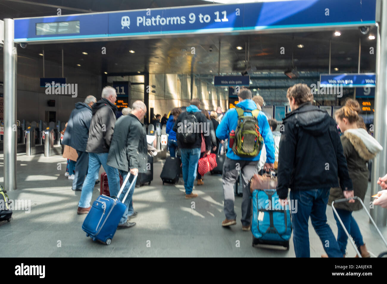 boarding train at platform Stock Photo - Alamy