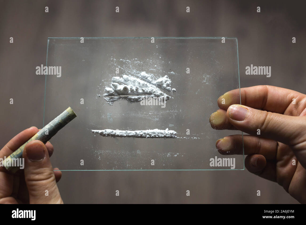 cocaine or speed in a line. addict with euro bill for snorting, drug ...