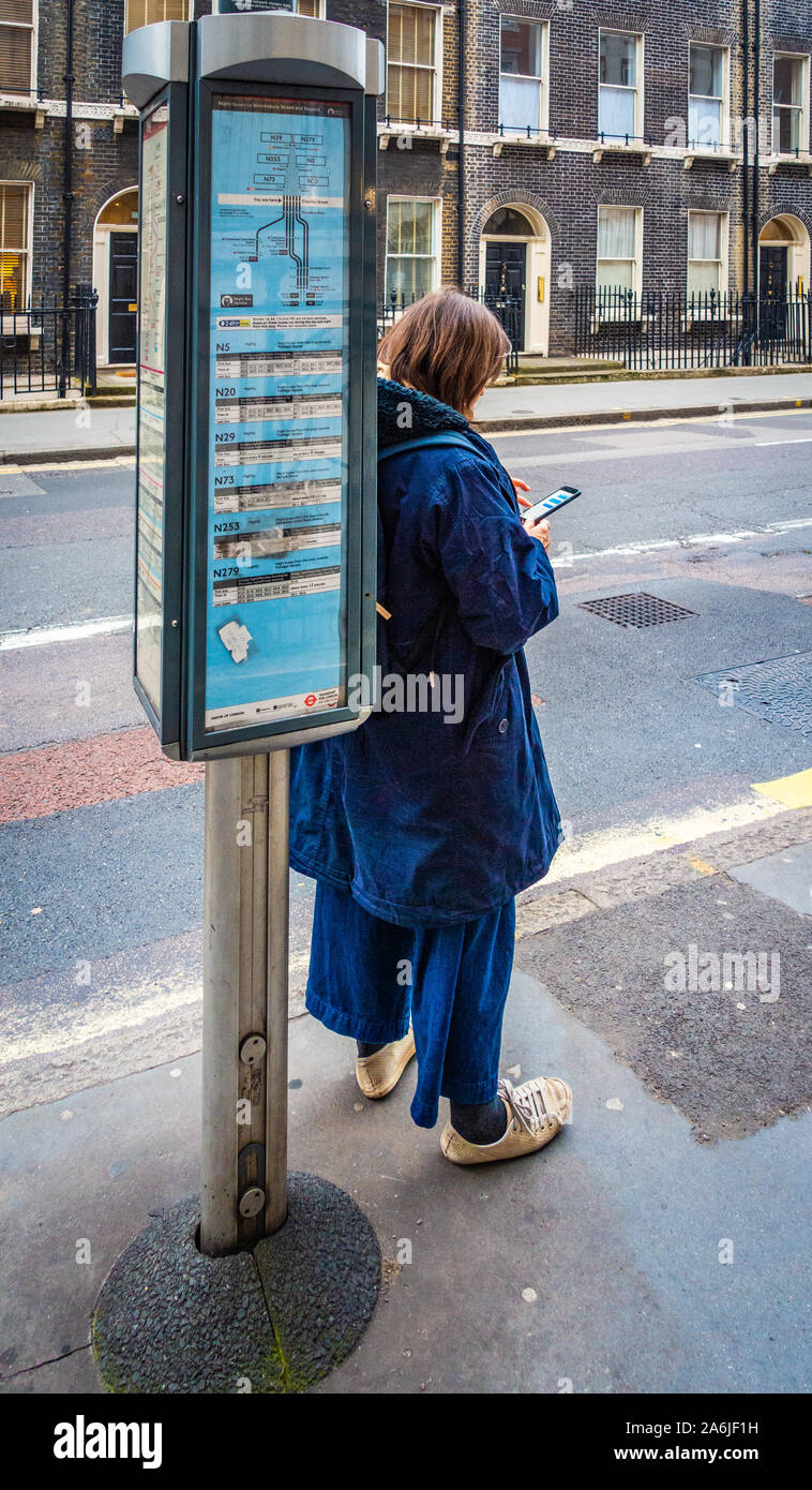 Bus stop poster and person hi-res stock photography and images - Alamy